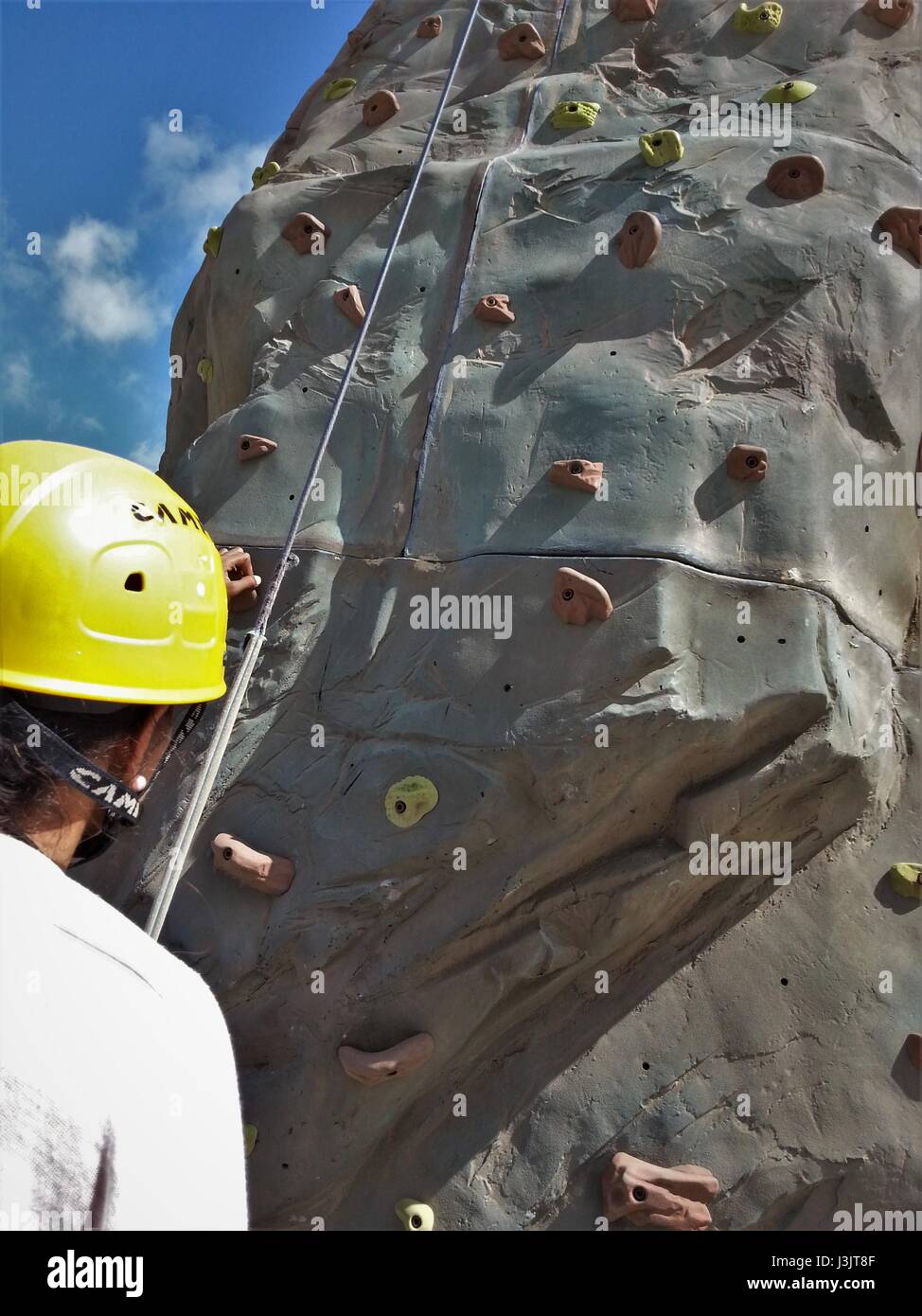 Girl about to go rock climbing Stock Photo - Alamy