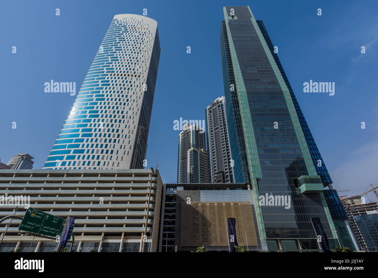 Street level view of Vision Tower, The Bay Gate Tower, and Tower M ...