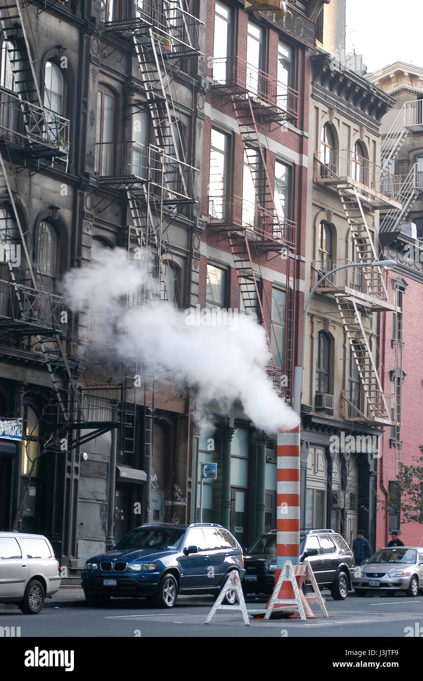 A steam vent in a New York city street Stock Photo - Alamy