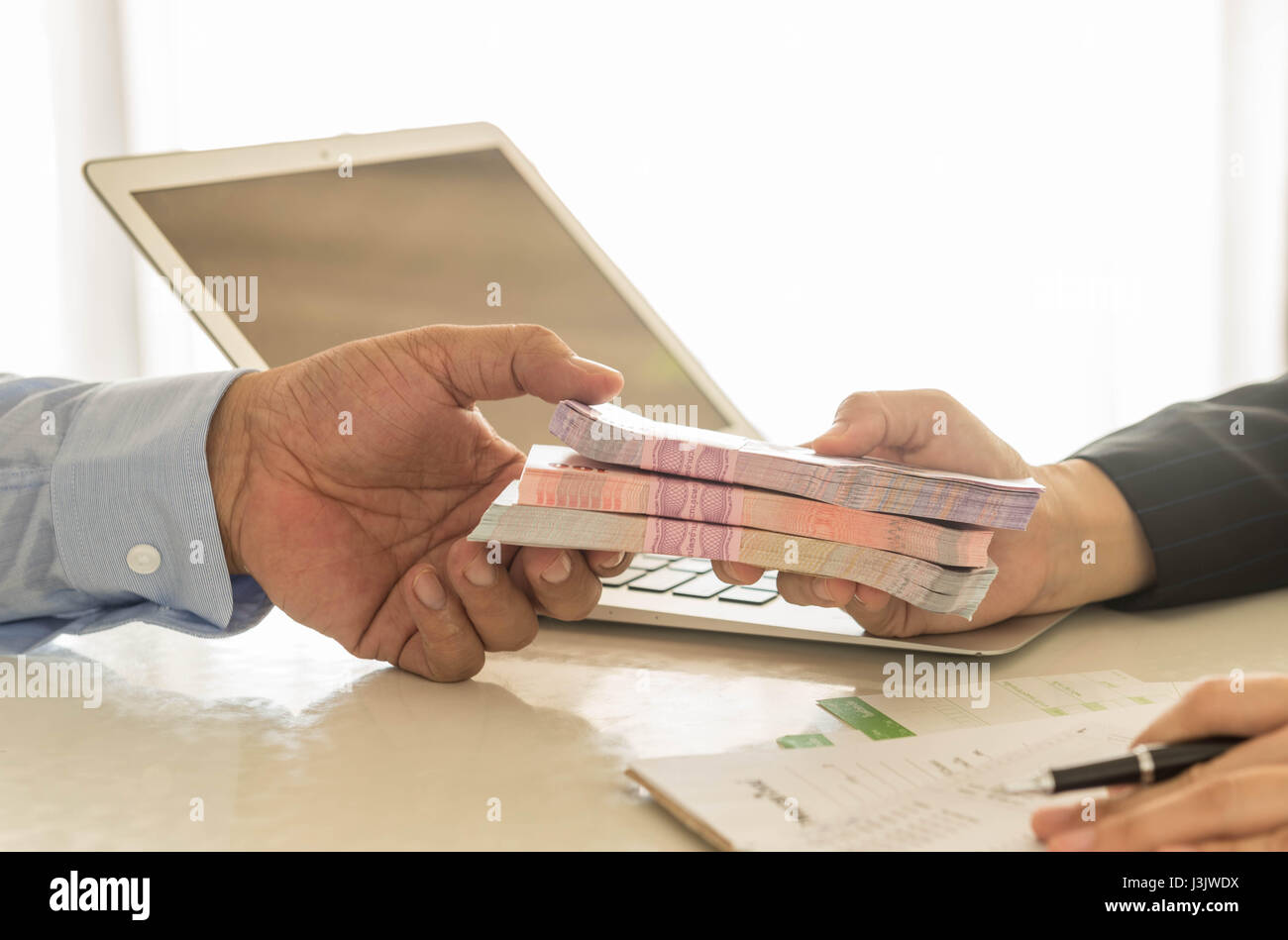 Business loan from a bank employee. finance concept Stock Photo - Alamy