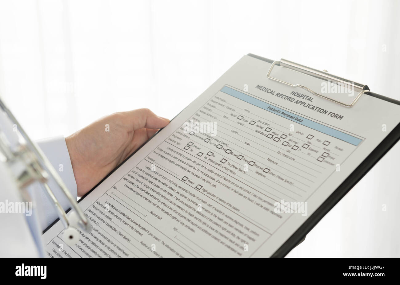 Medical documents in hand doctors on a white background Stock Photo - Alamy