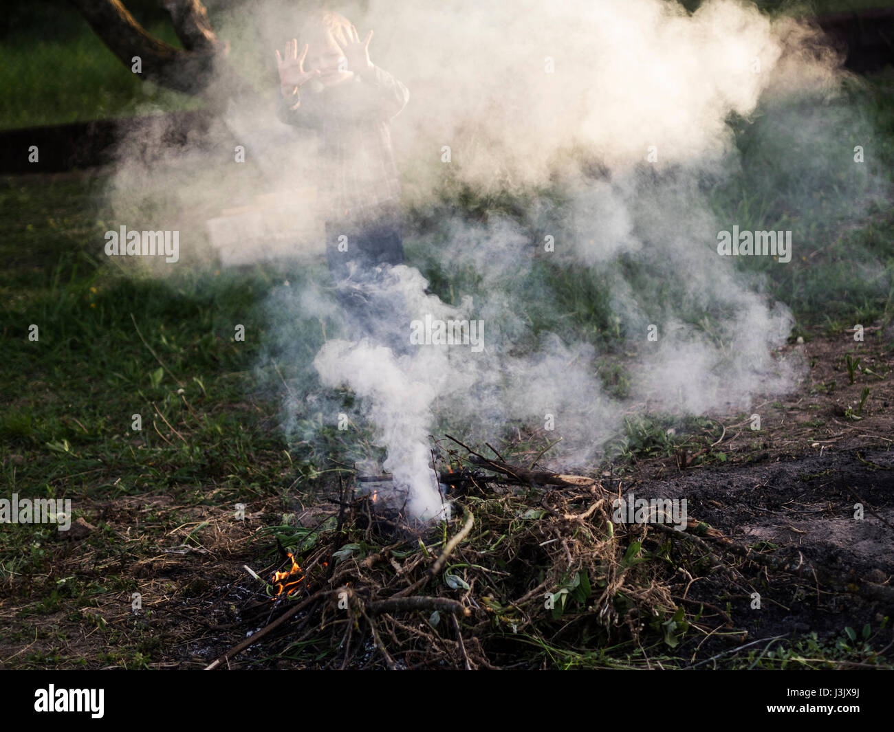 Person making bonfire hi-res stock photography and images - Alamy