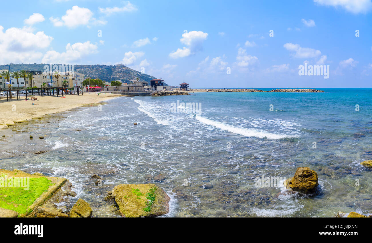 HAIFA, ISRAEL - MAY 05, 2017: Beach scene with locals, and the ...