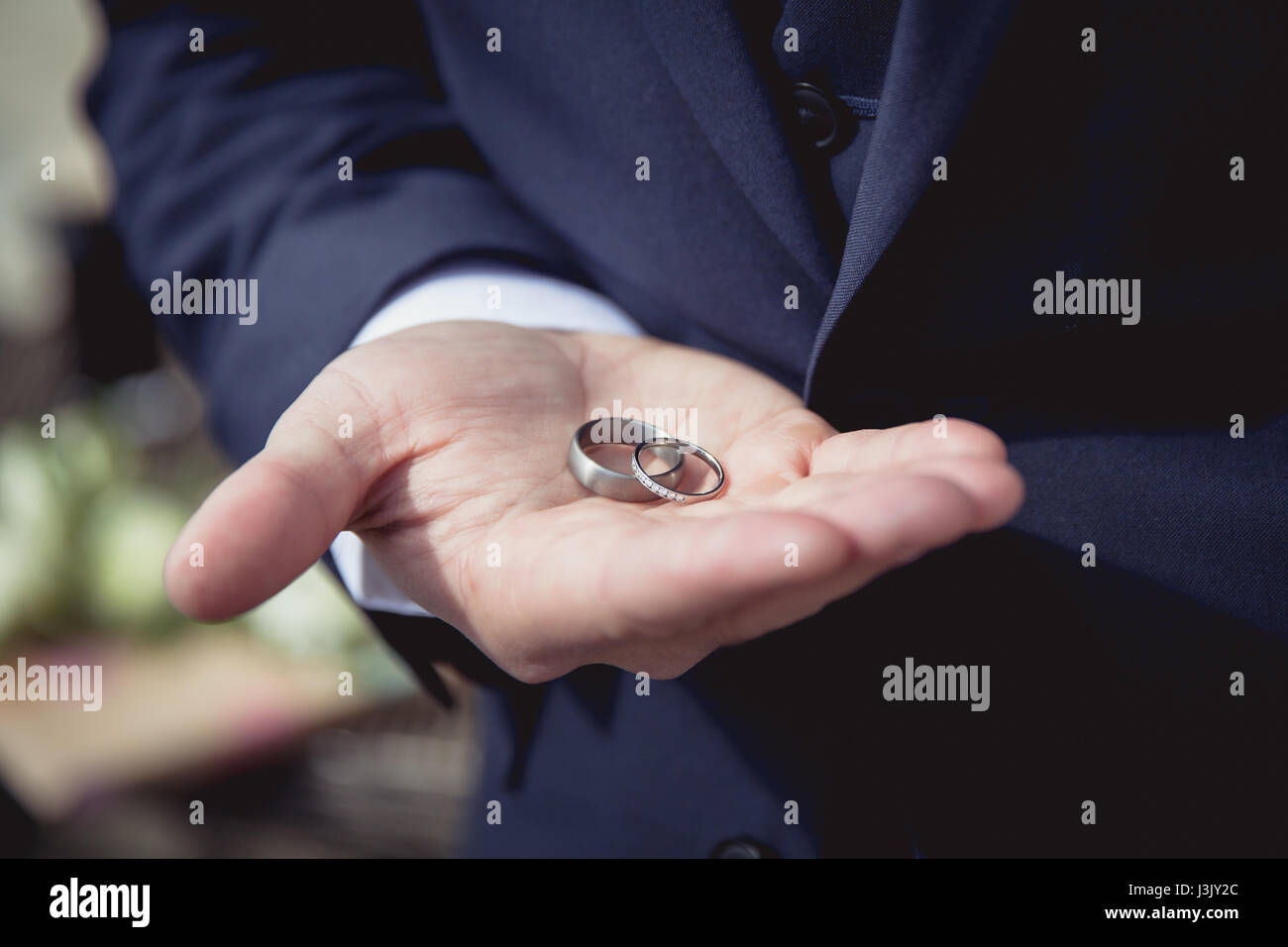 Best Man Holding Wedding Rings Stock Photo - Alamy