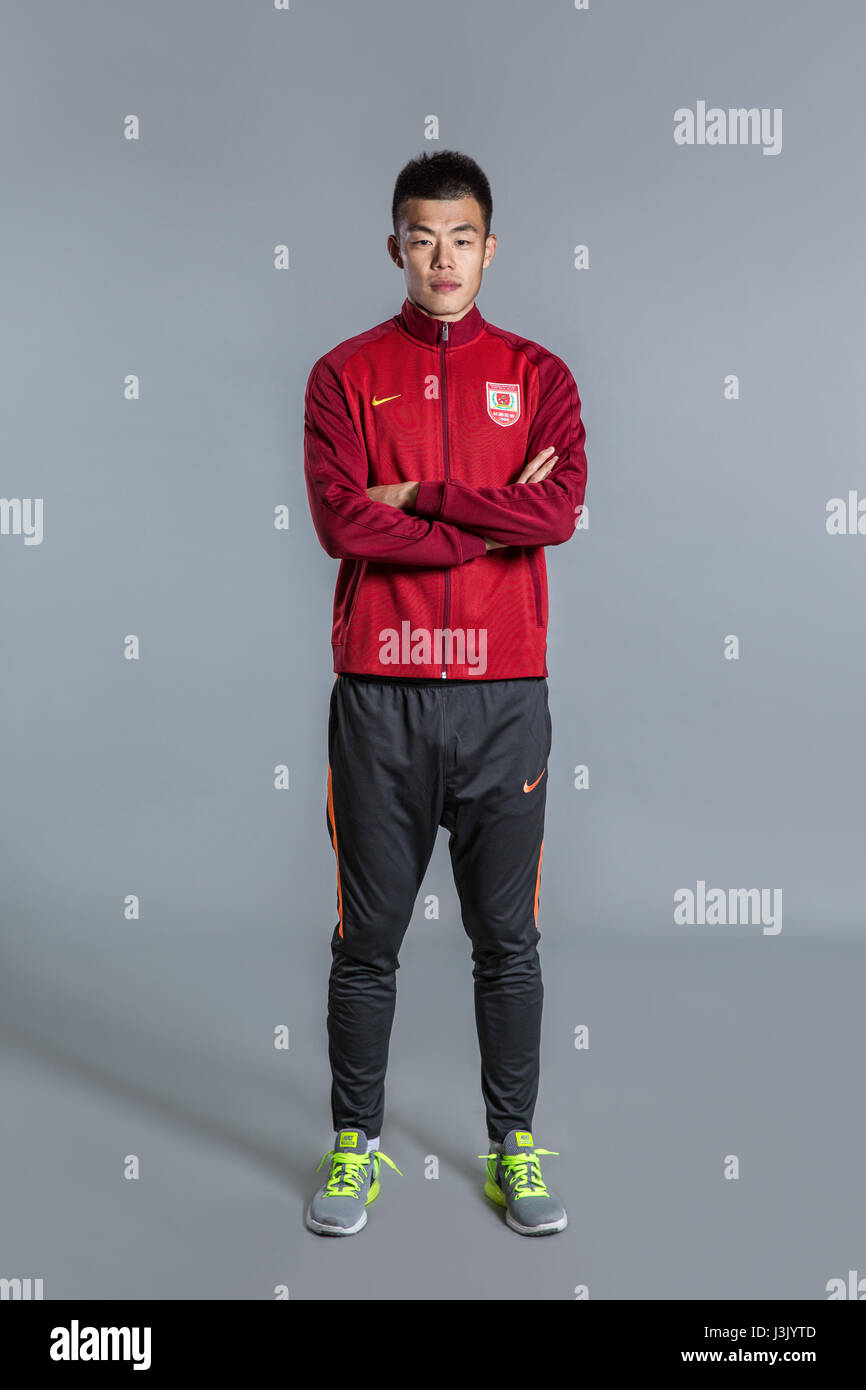 Portrait of Chinese soccer player Tan Long of Changchun Yatai F.C. for ...