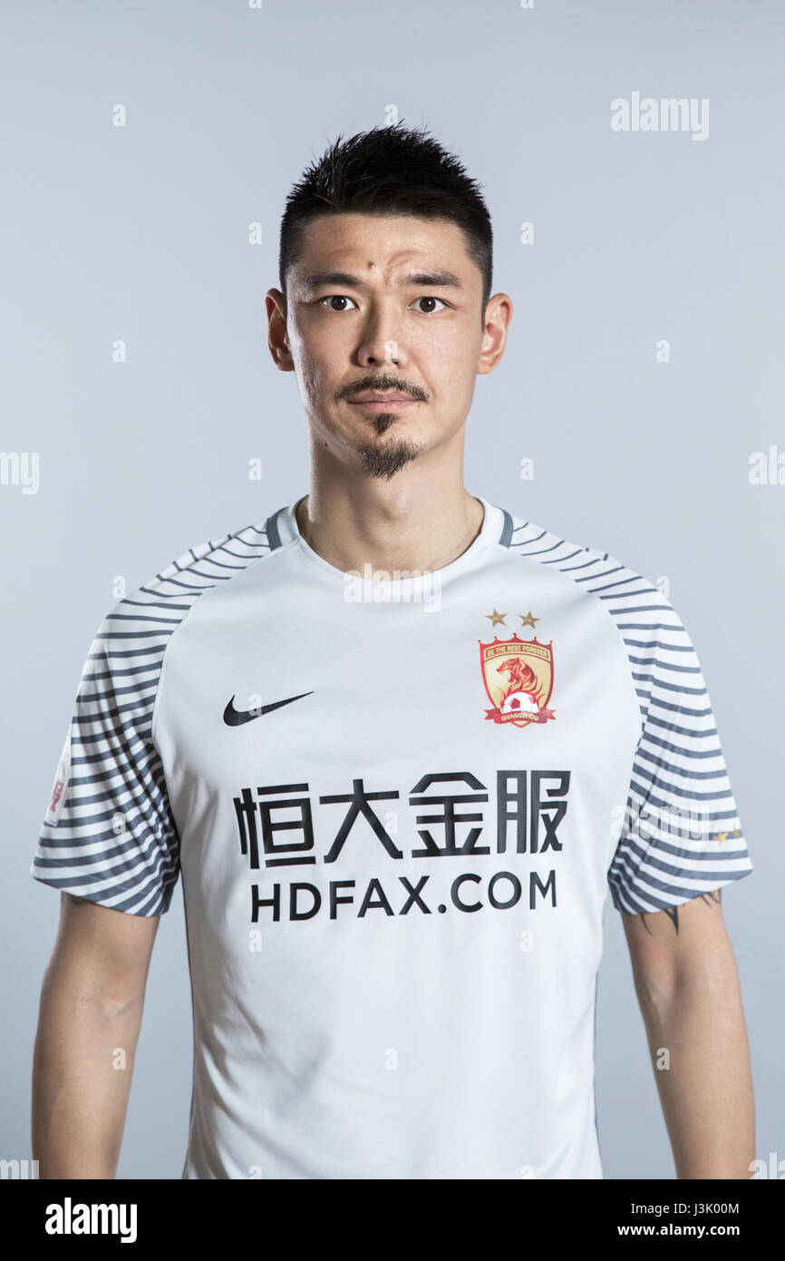 Portrait of Chinese soccer player Zeng Cheng of Guangzhou Evergrande ...