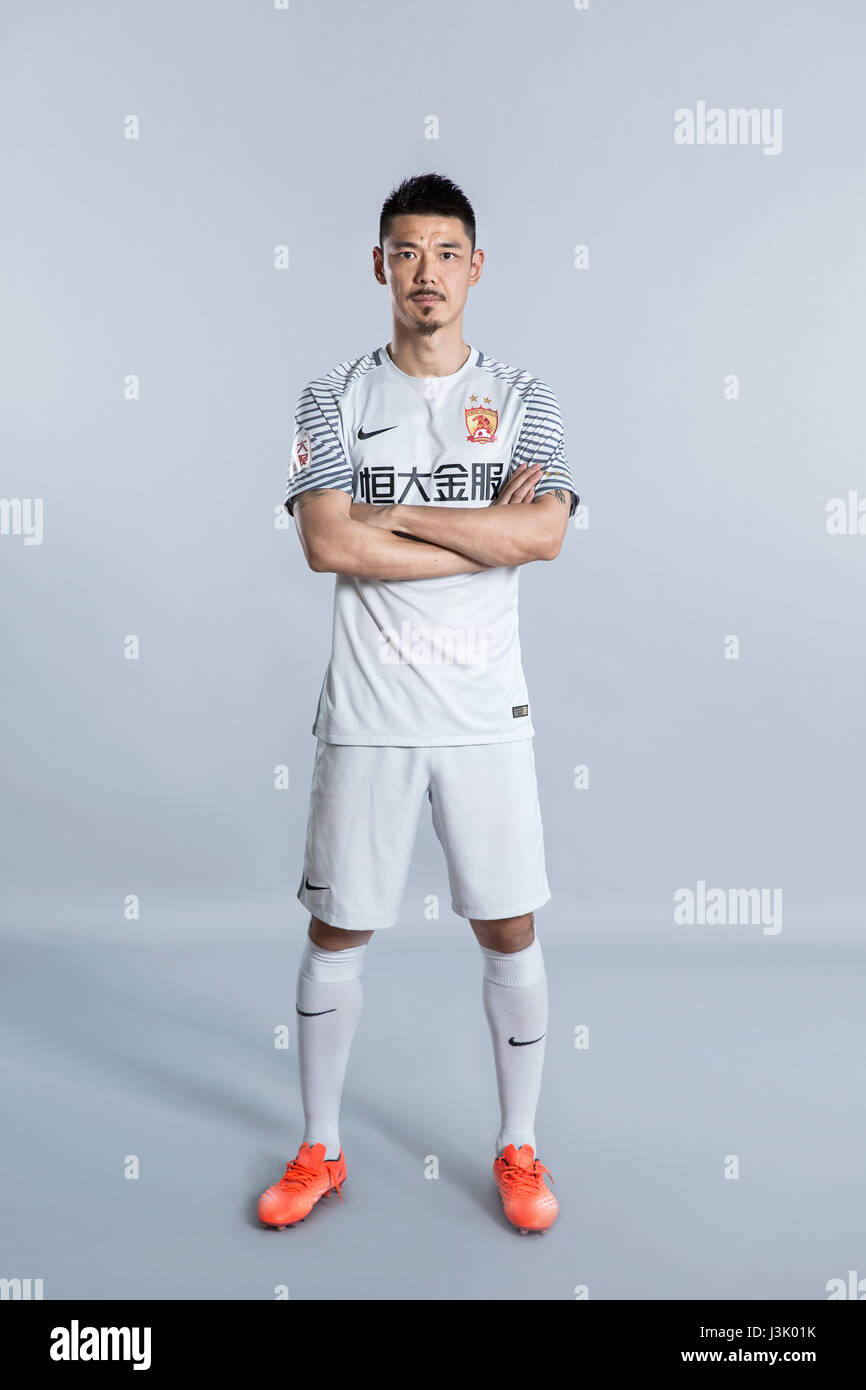 Portrait of Chinese soccer player Zeng Cheng of Guangzhou Evergrande ...
