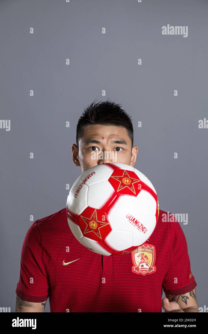 Portrait of Chinese soccer player Zeng Cheng of Guangzhou Evergrande ...