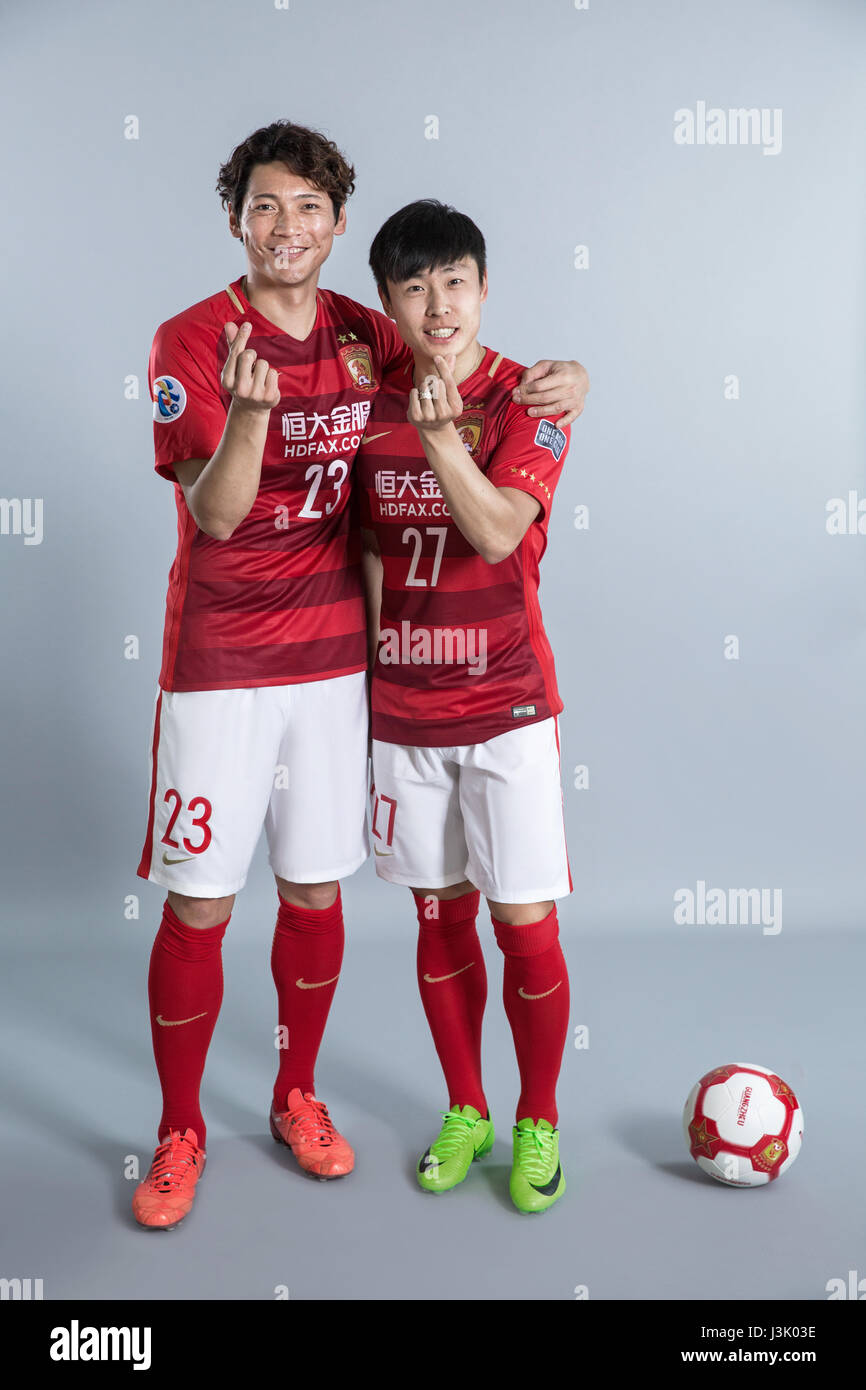 Portrait of South Korean soccer player Kim Hyung-il, left, and Zheng ...