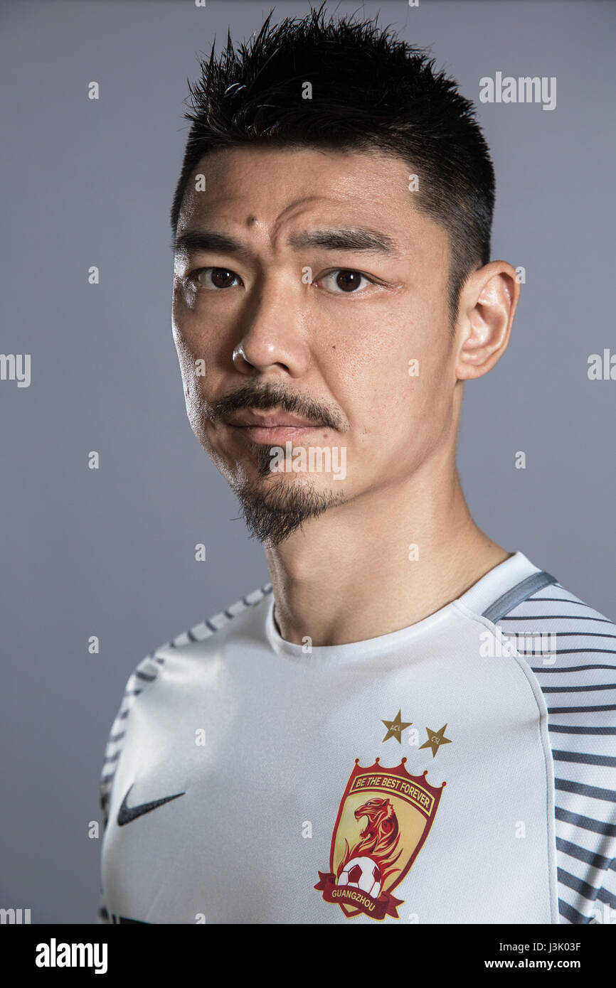 Portrait of Chinese soccer player Zeng Cheng of Guangzhou Evergrande ...