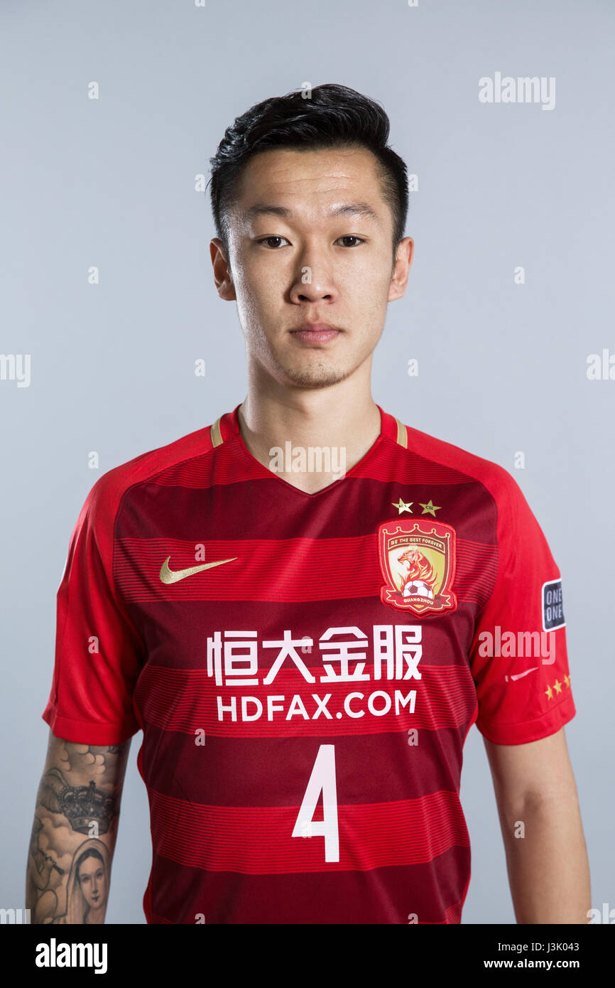 Portrait of Chinese soccer player Xu Xin of Guangzhou Evergrande Taobao ...