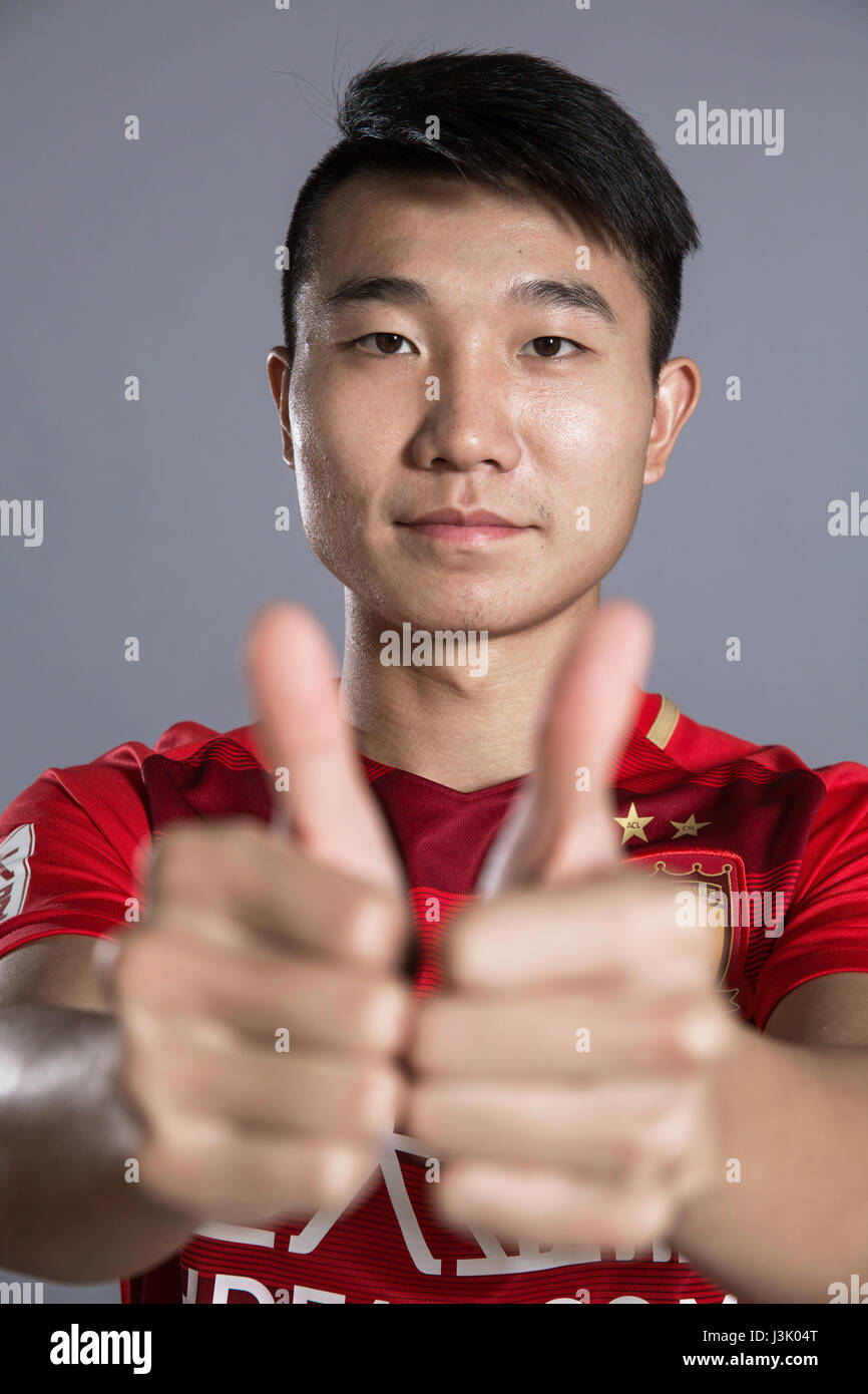 Portrait of Chinese soccer player Yang Xin of Guangzhou Evergrande ...