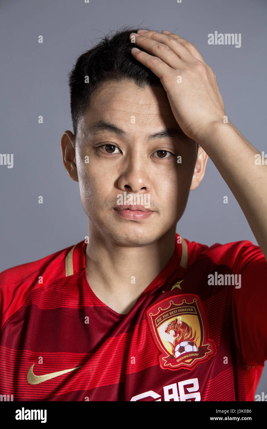 Portrait of Chinese soccer player Liu Jian of Guangzhou Evergrande ...