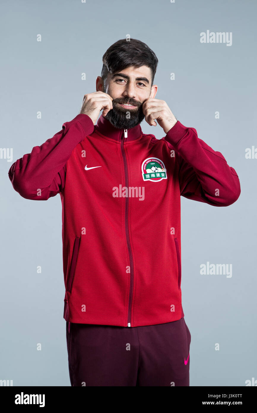 Portrait of Syrian soccer player Ahmad Al Salih of Henan Jianye F.C ...
