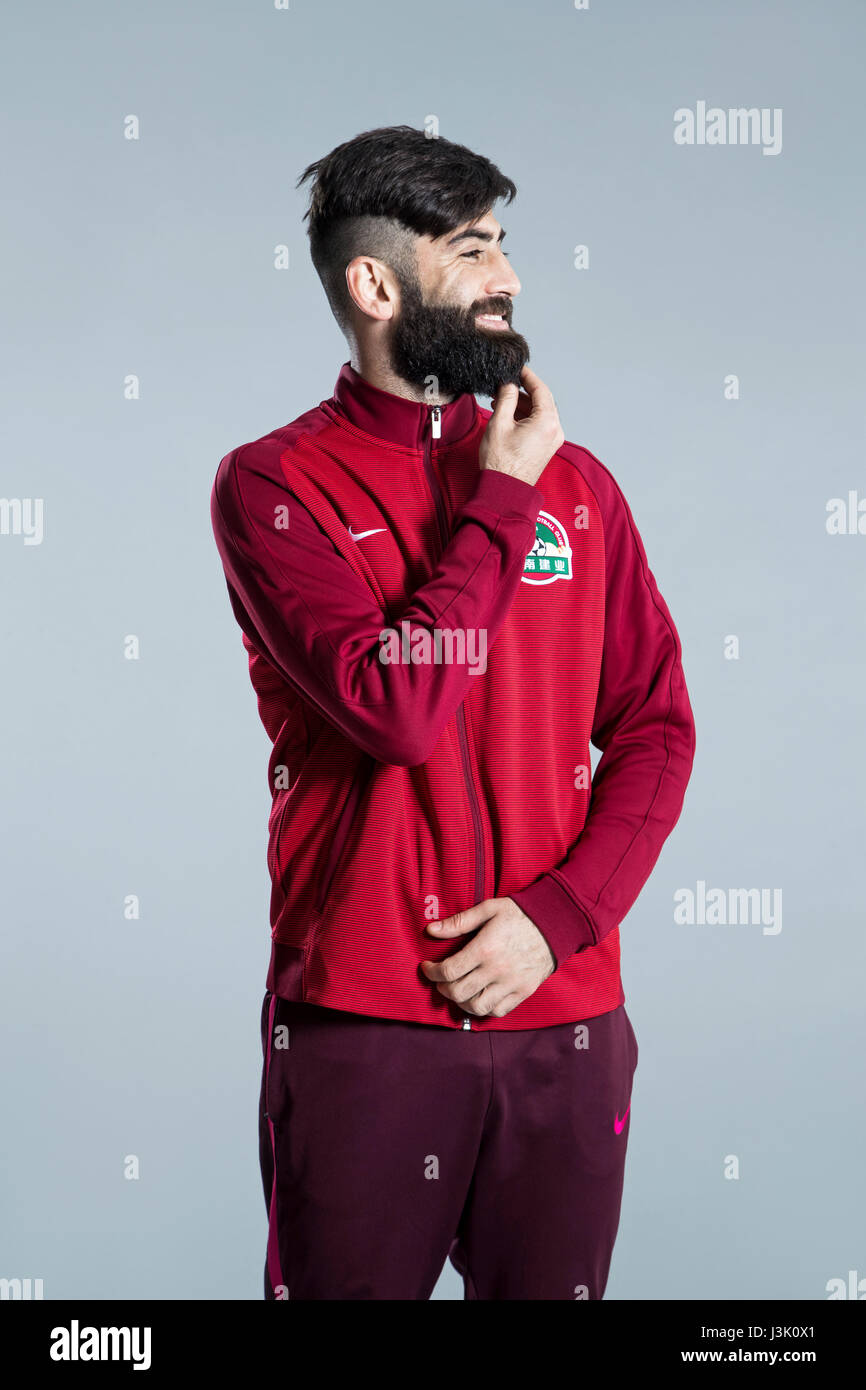 Portrait of Syrian soccer player Ahmad Al Salih of Henan Jianye F.C ...