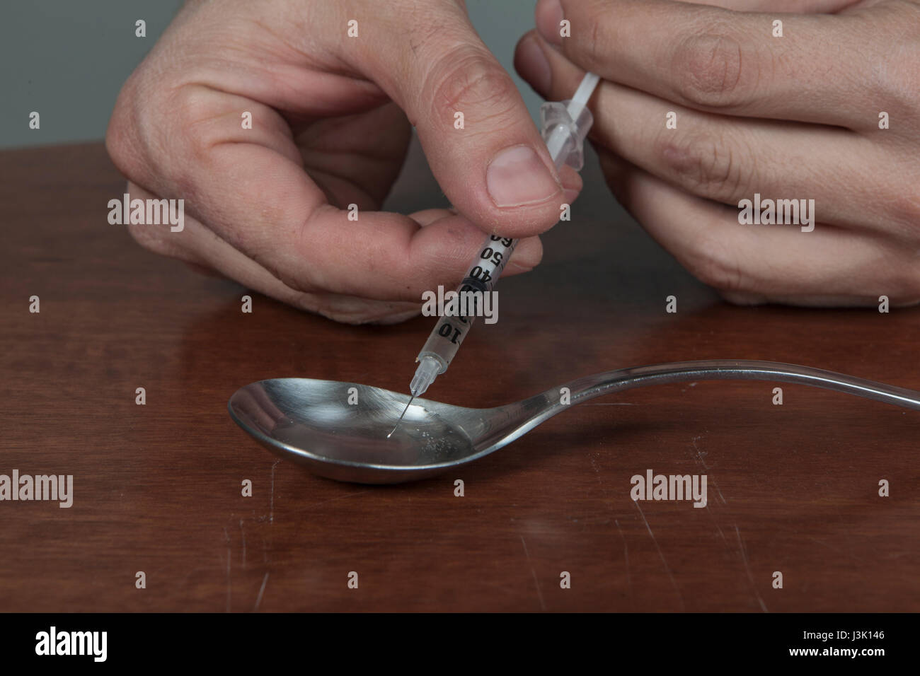 Drugs preparation begore use under studio lights Stock Photo - Alamy