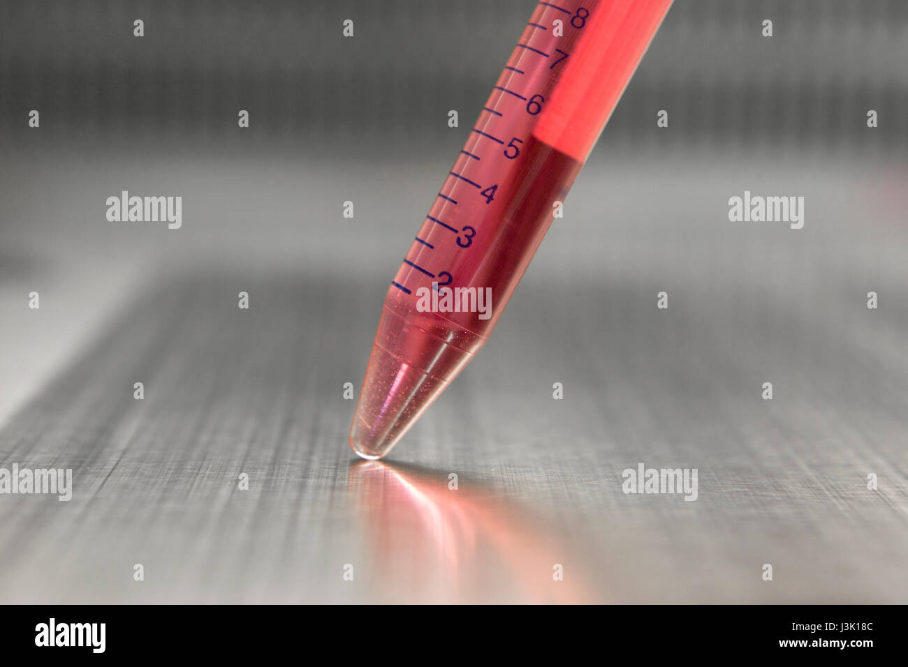 Test-tube with blood sample in bio lab under studio lights Stock Photo ...