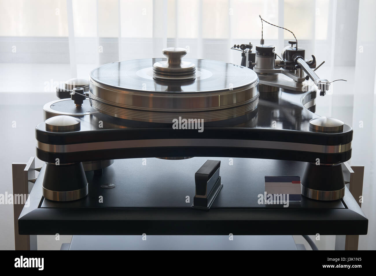 High end turntable in the room near the window Stock Photo - Alamy