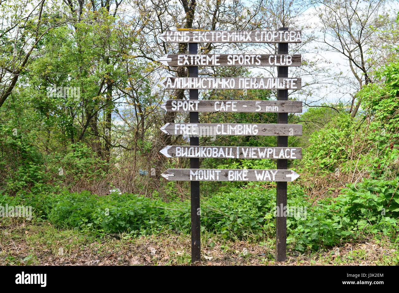 Wooden direction arrow signs isolated over white Stock Photo - Alamy