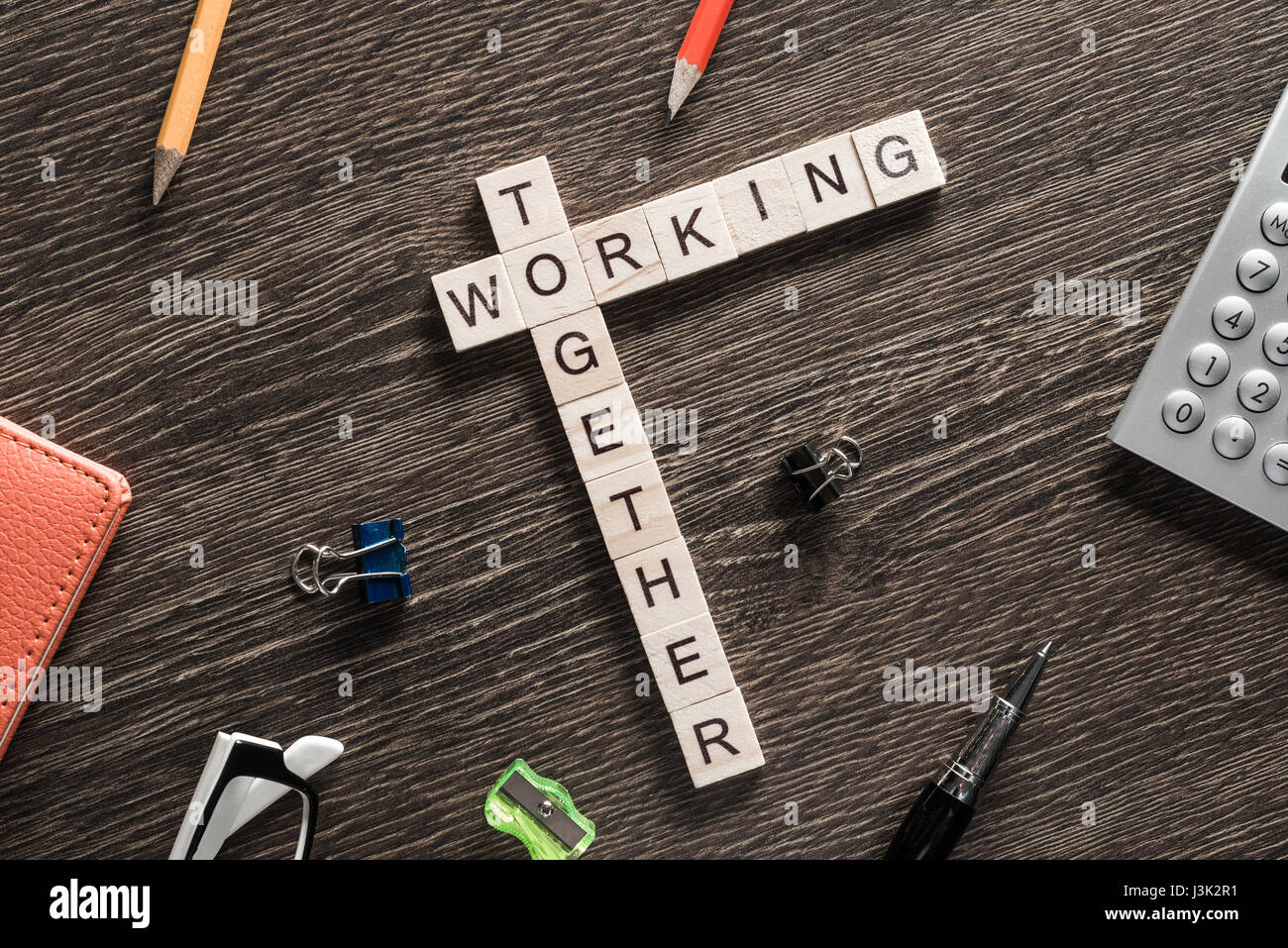 Conceptual business keywords on table with elements of game making ...