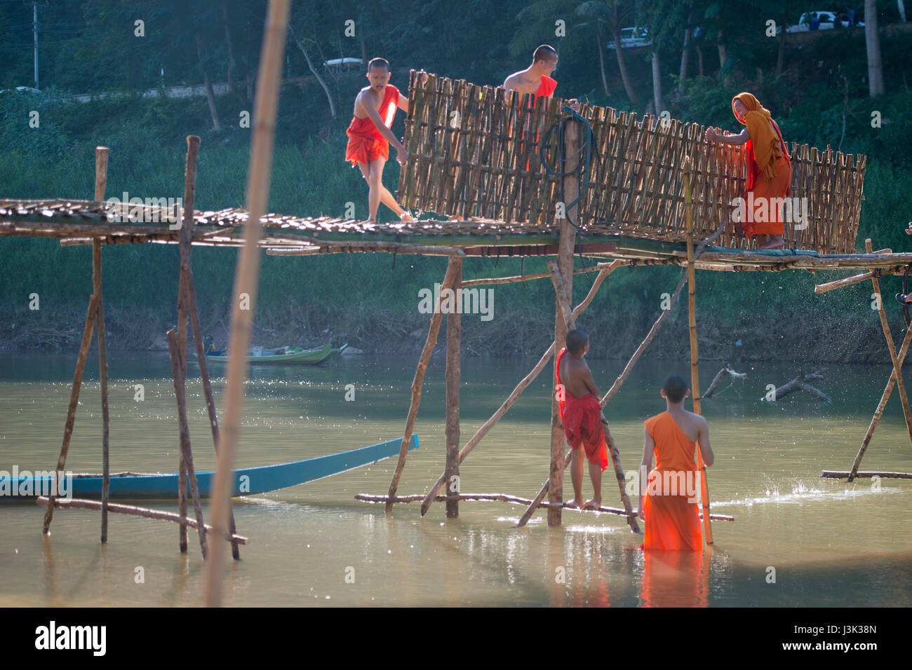 Lao bamboo river bridge hi-res stock photography and images - Alamy