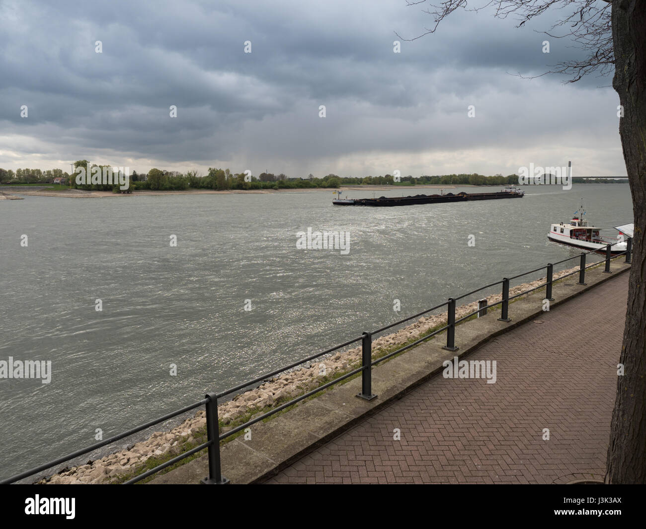 Ship drives the Rhine upstream, Rees, Germany Stock Photo - Alamy