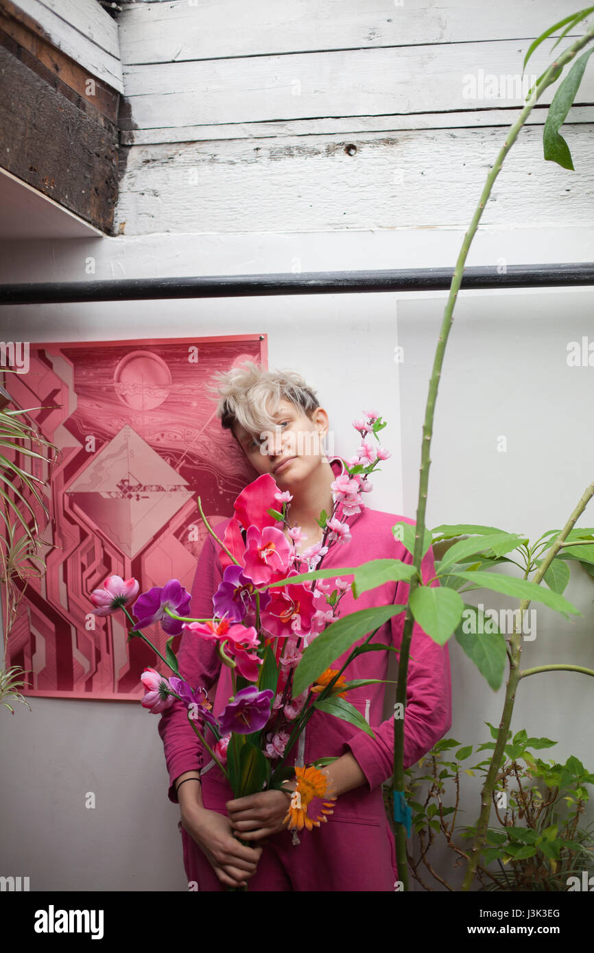 Young woman hanging out in her apartment Stock Photo - Alamy