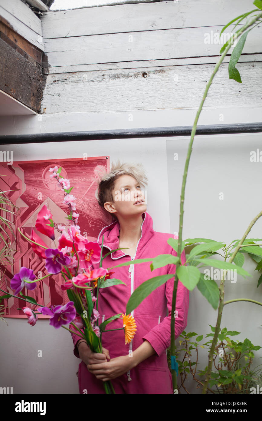 Young woman hanging out in her apartment Stock Photo - Alamy