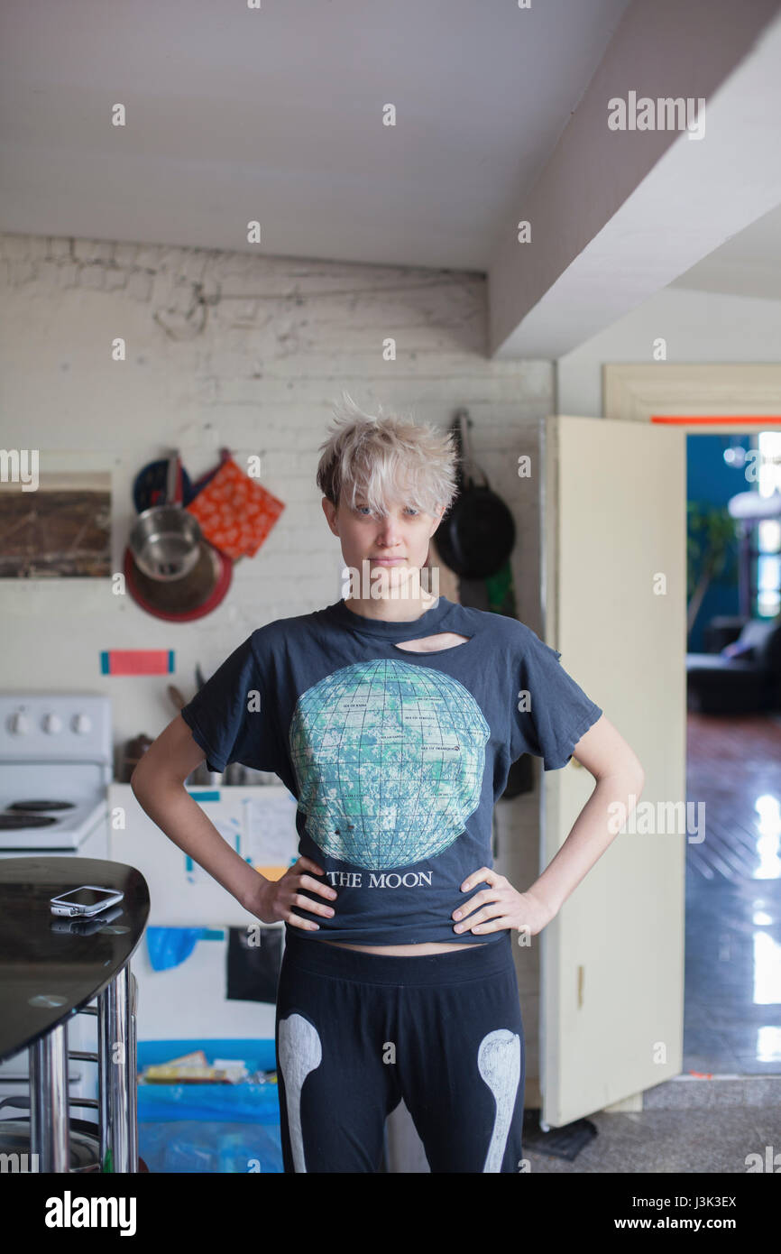 Young woman hanging out in her apartment Stock Photo - Alamy