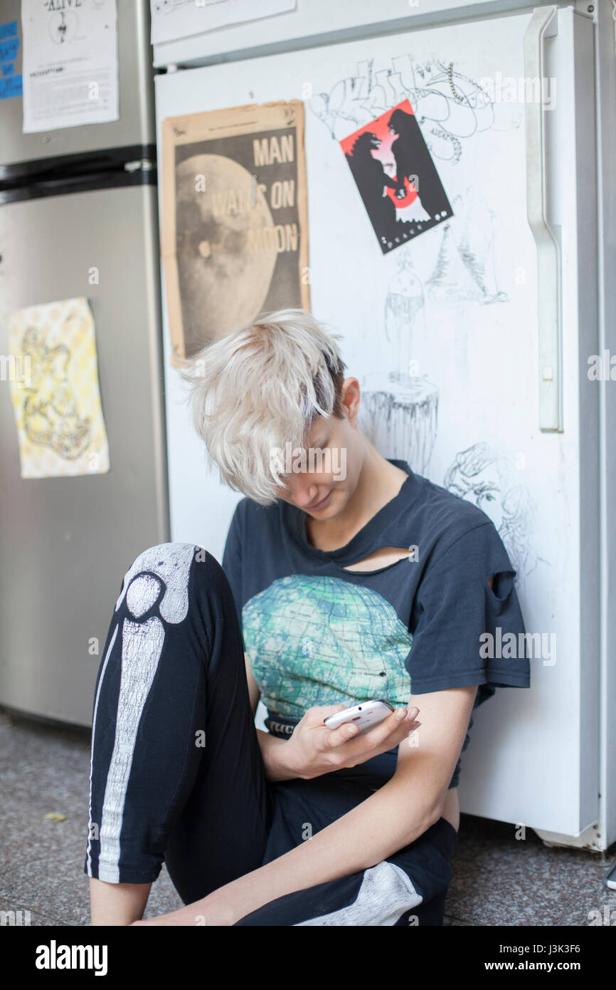 Young woman hanging out in her apartment Stock Photo - Alamy