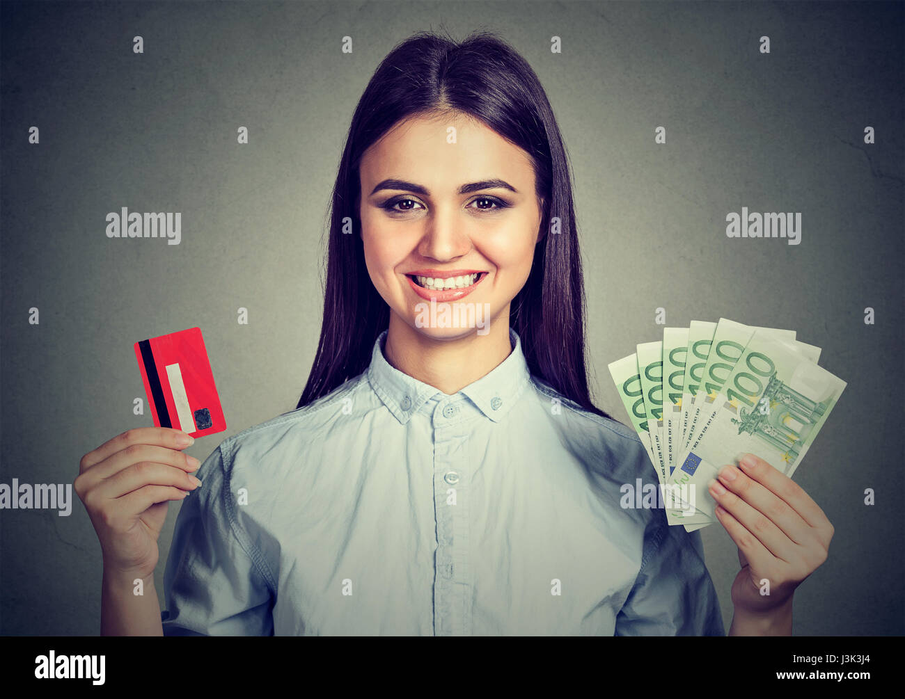 Shopping woman holding showing credit card and cash euro banknotes ... Shopping woman holding showing credit card and cash euro banknotes ...