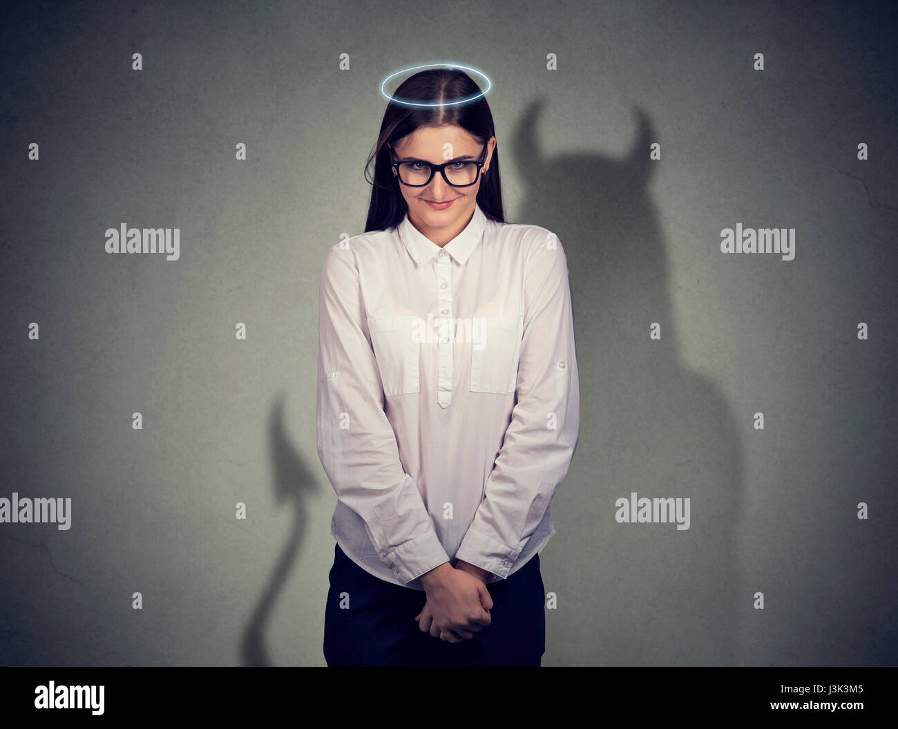 Woman devil and angel hi-res stock photography and images - Alamy