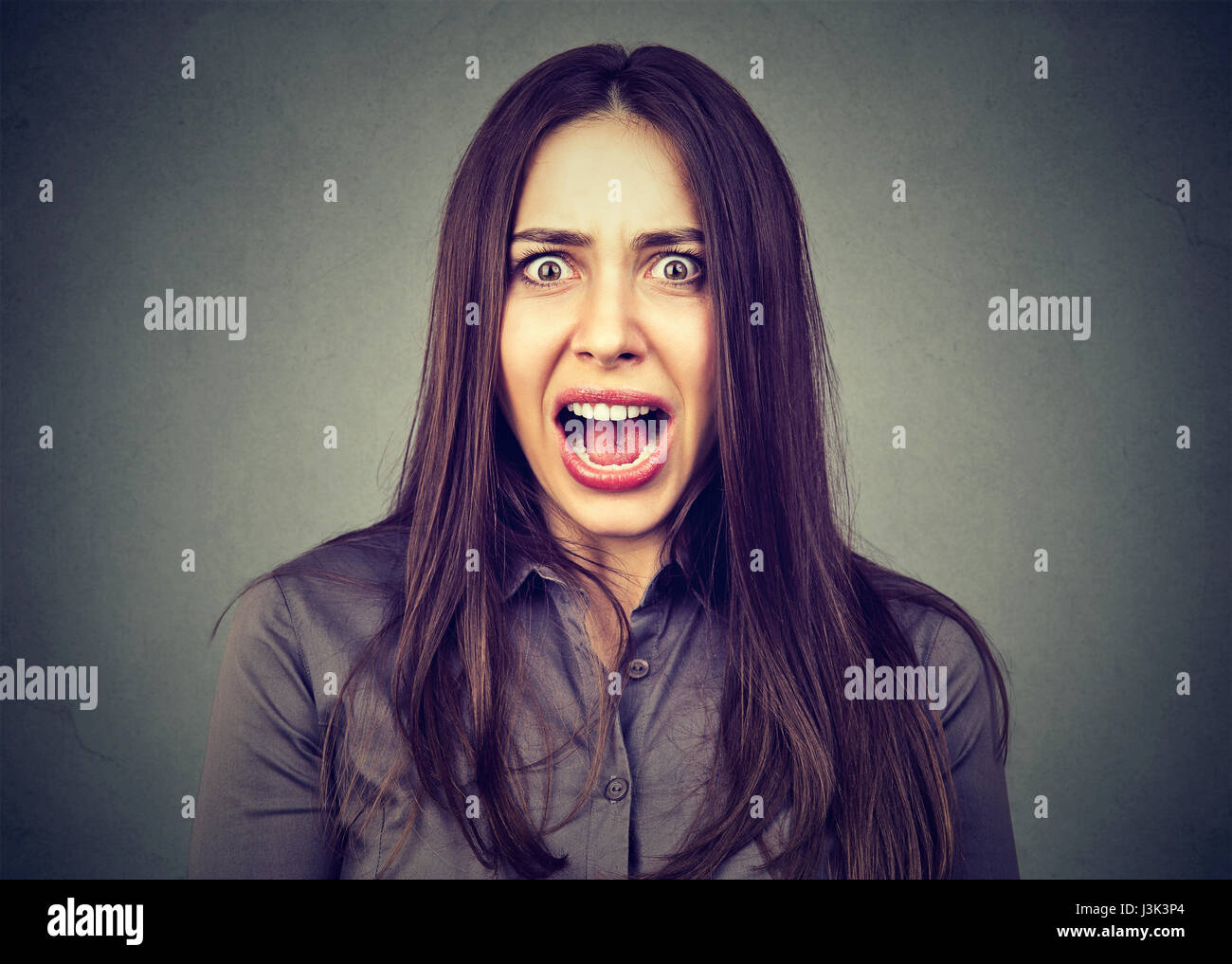 Annoyed angry woman screaming Stock Photo - Alamy