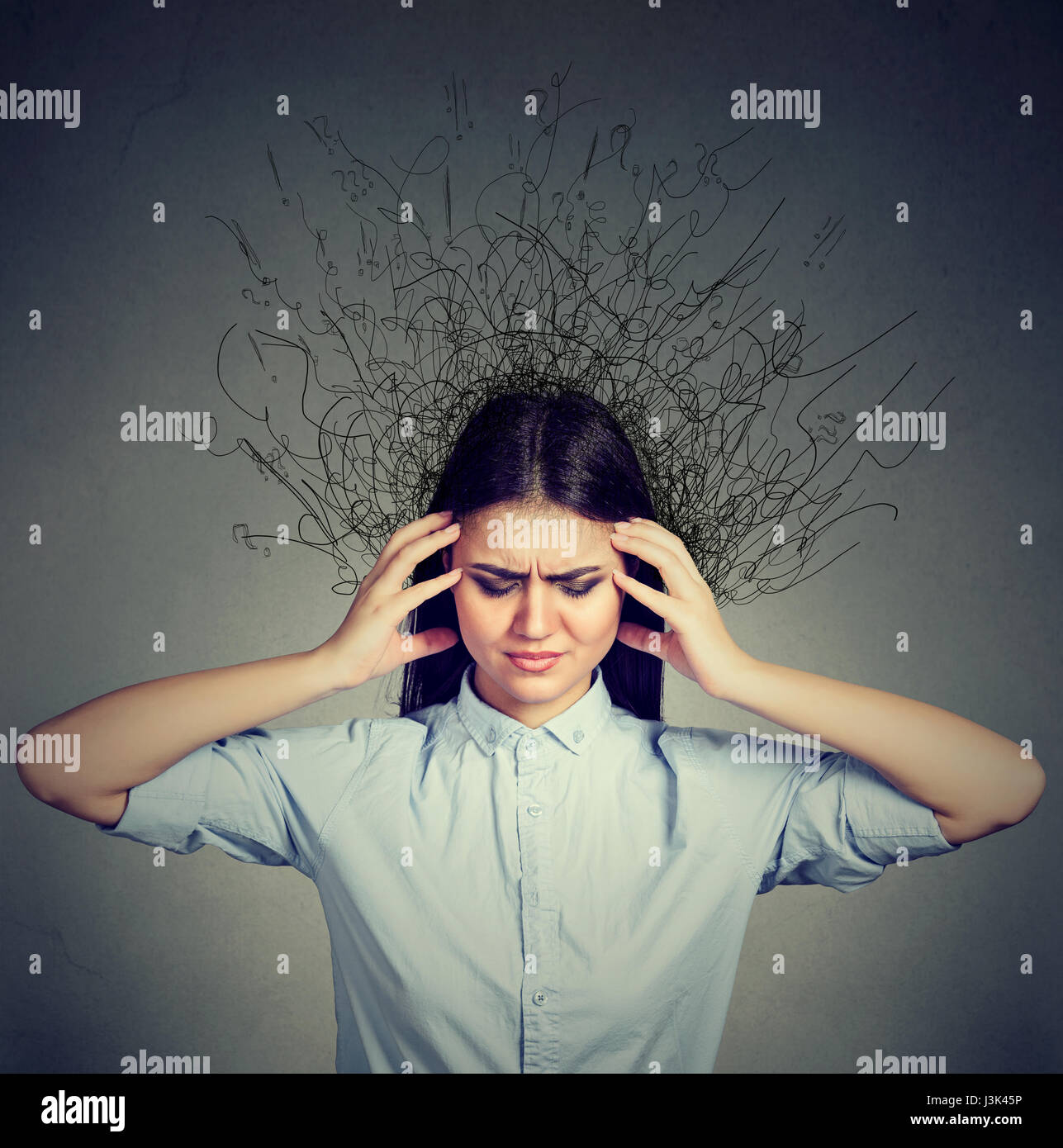 closeup sad young woman with worried stressed face expression and brain ...