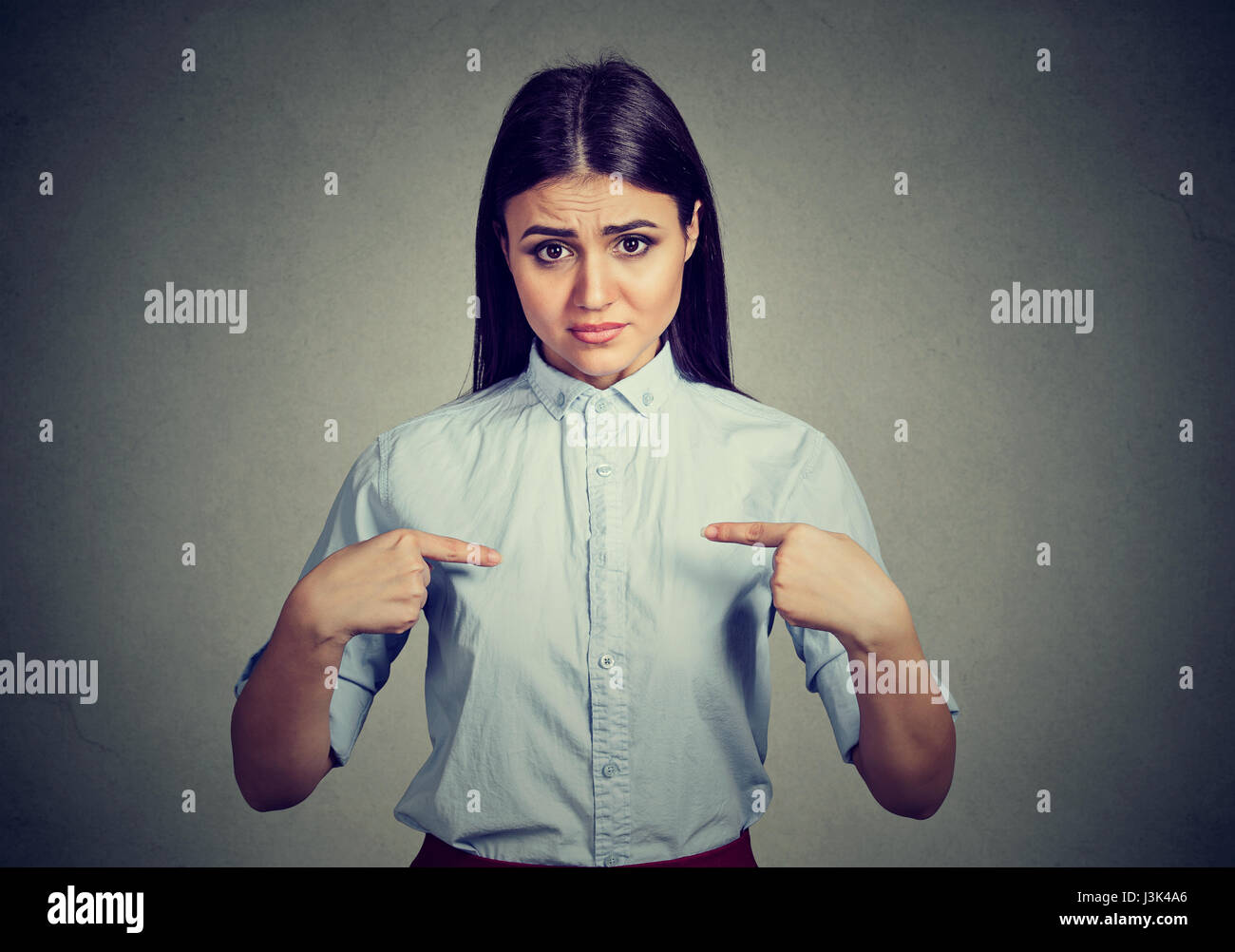 Angry annoyed woman asking you talking to me? Isolated on gray ...