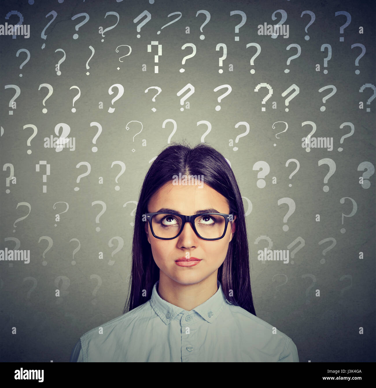 Too many questions. Confused woman Stock Photo - Alamy Too many questions. Confused woman Stock Photo - Alamy