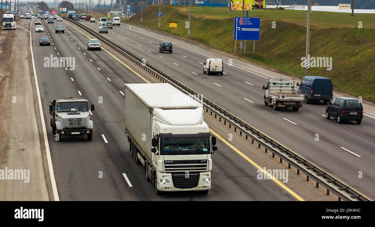 The movement of motor transport on the main road Stock Photo - Alamy