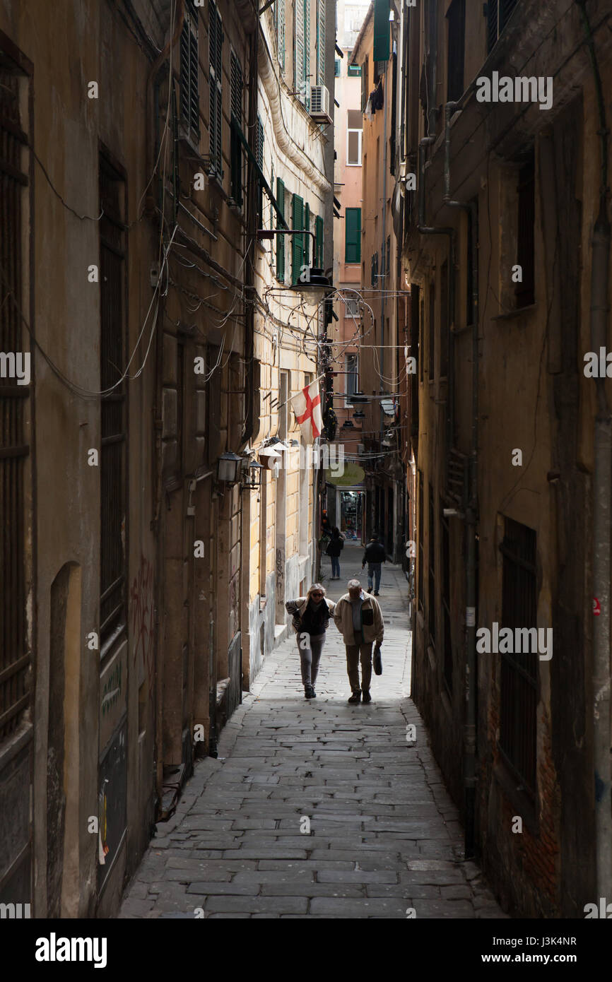 Narrow medieval street Via San Luca in Genoa, Liguria, Italy Stock ...