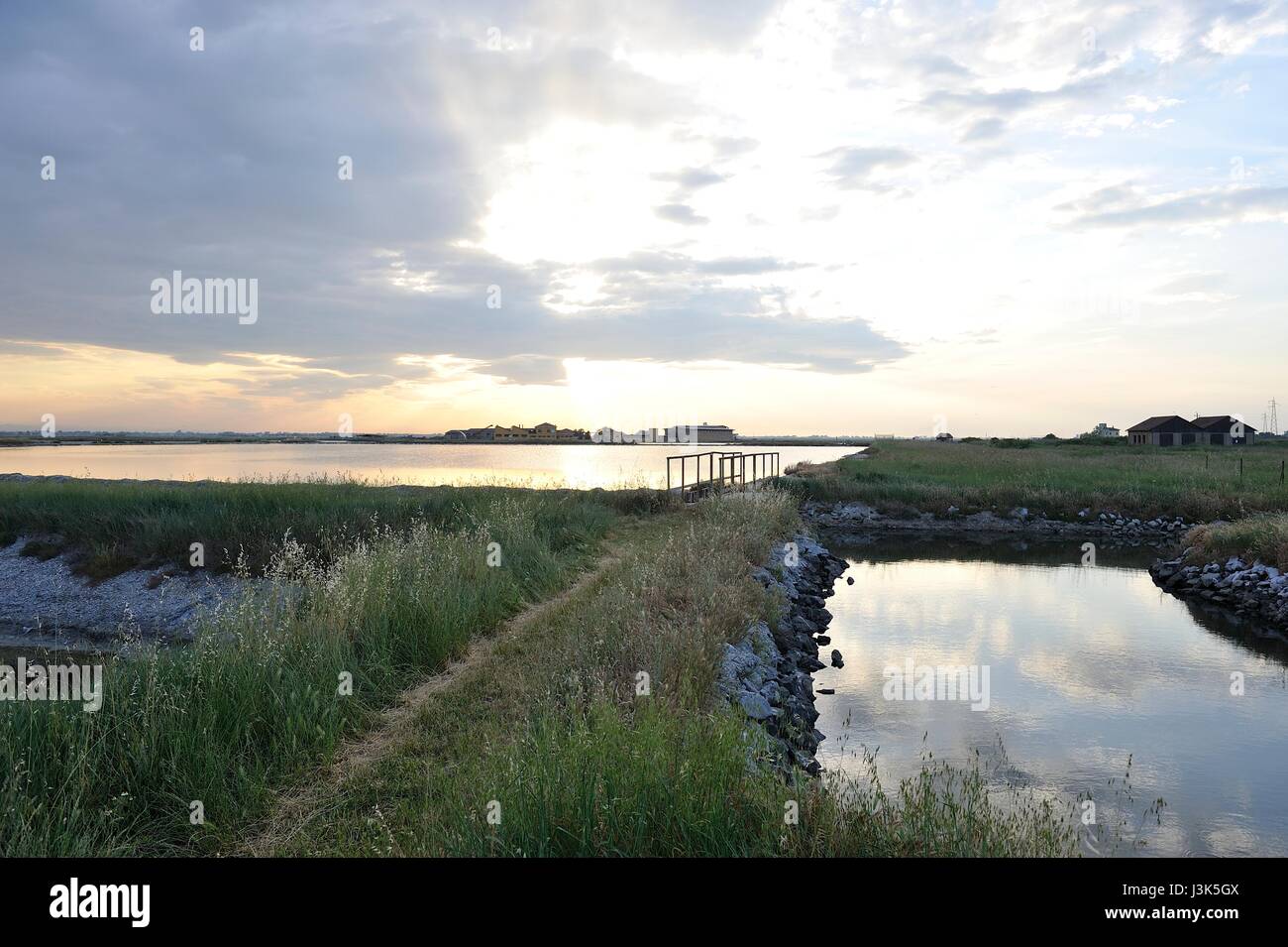 San Michele tower and the old salt deposit and Salt Museum, salt flats ...