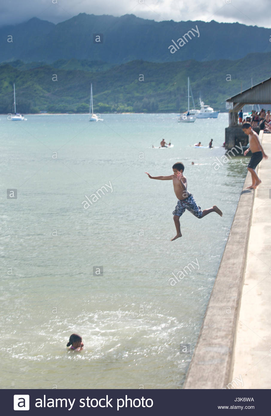 Boy Jumping Off Pier High Resolution Stock Photography and Images - Alamy
