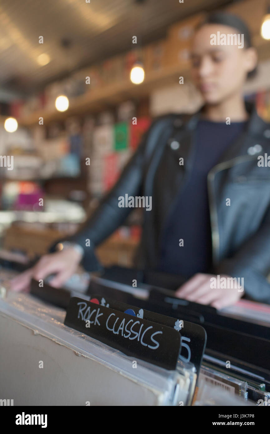 Young woman in a record store Stock Photo - Alamy