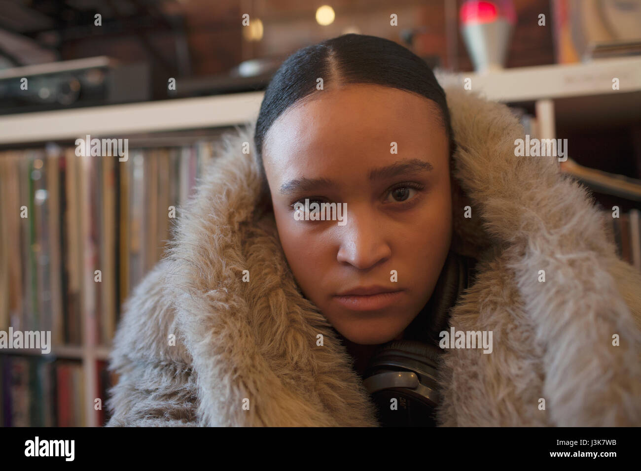 Young woman by record collection Stock Photo - Alamy