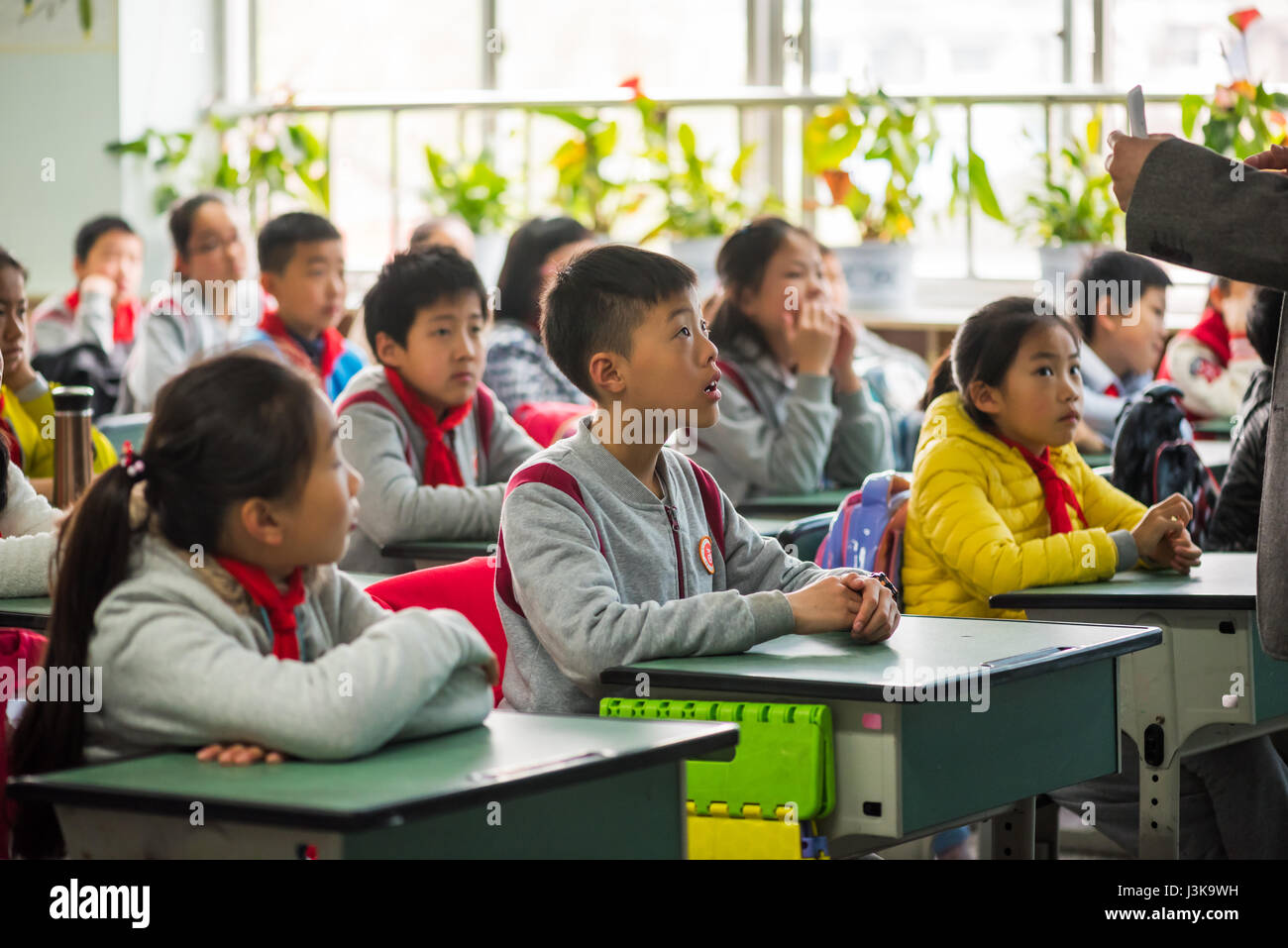Chengdu, Sichuan Province, China - March 31, 2017: Teacher giving a ...