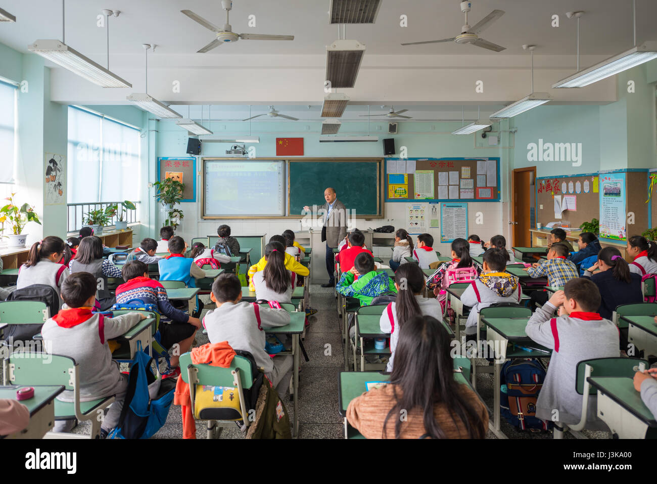 Chengdu, Sichuan Province, China - March 31, 2017: Teacher giving a ...