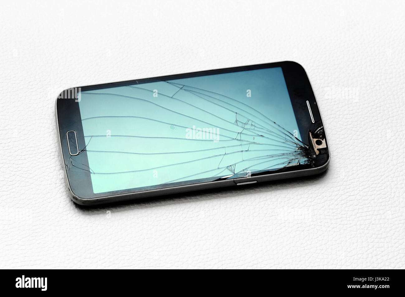 Phone screen is cracked,Phone screen break on white leather pad Stock ...