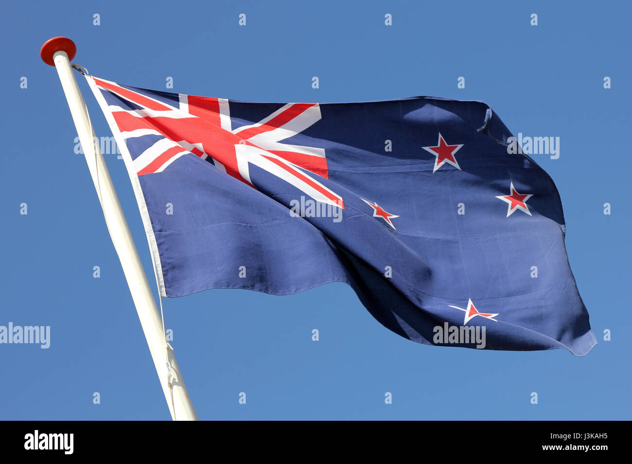 New Zealand flag flying in the wind Stock Photo - Alamy