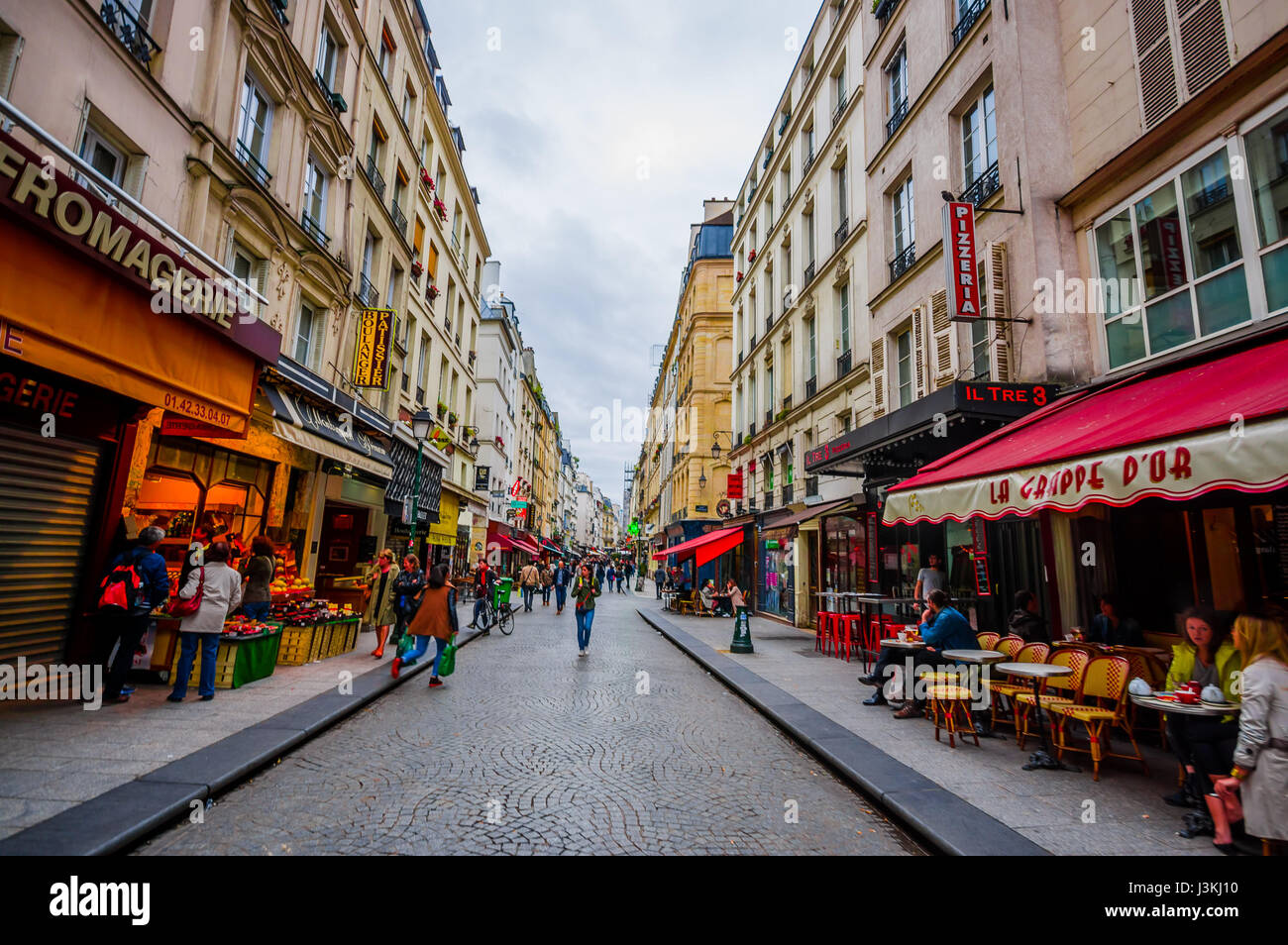 Paris, France June 1, 2015: Cozy and beautiful walking through historic ...