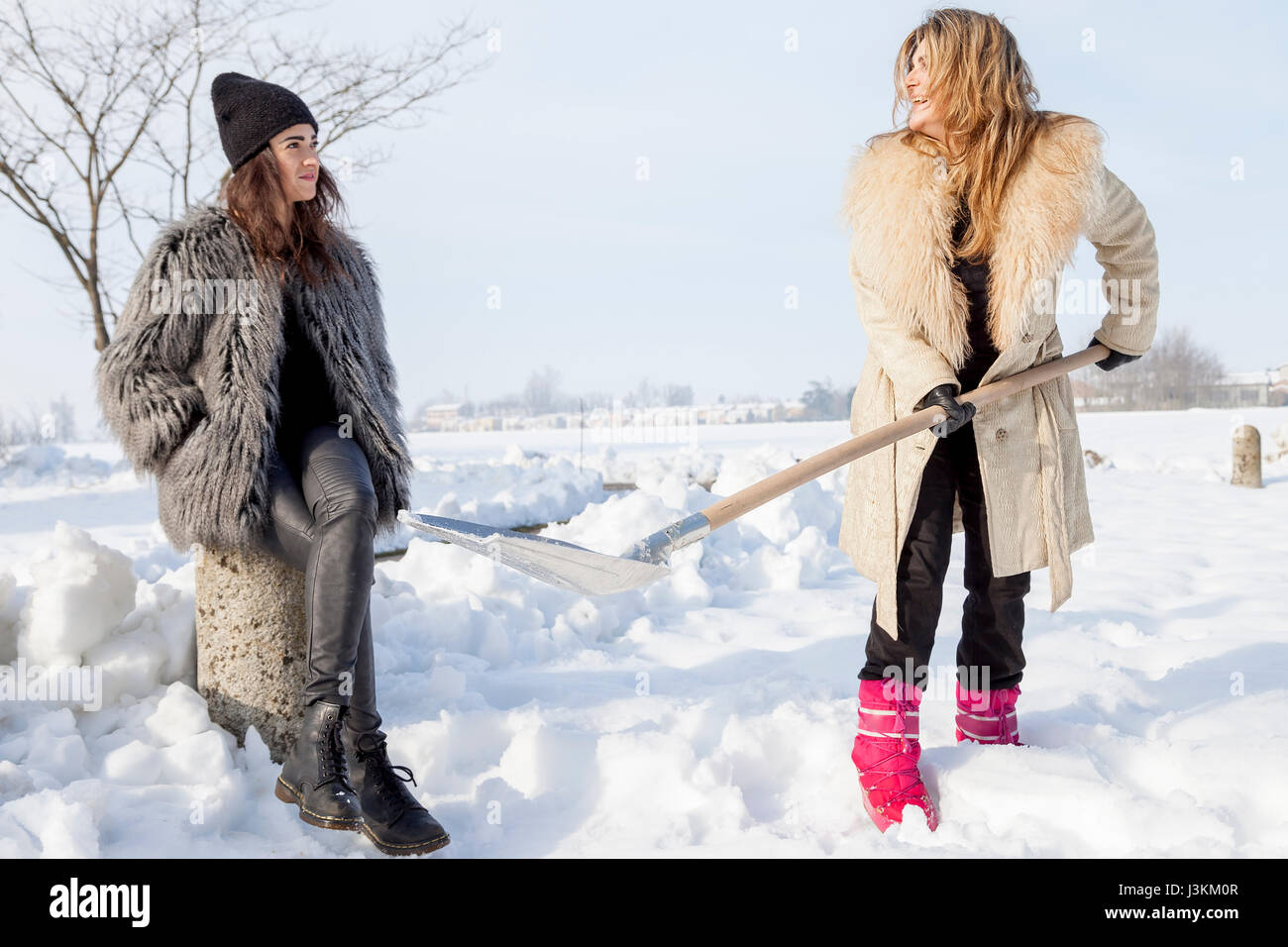 Woman Shoveling Snow Stock Photos & Woman Shoveling Snow Stock Images ...