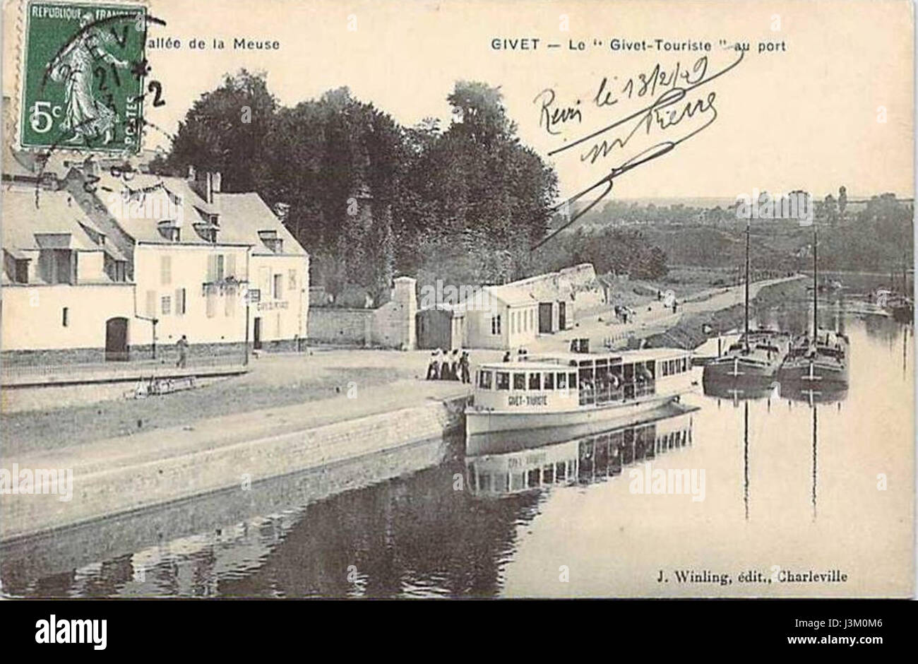 This scene from Givet, France, illustrates the tourism area by the port ...