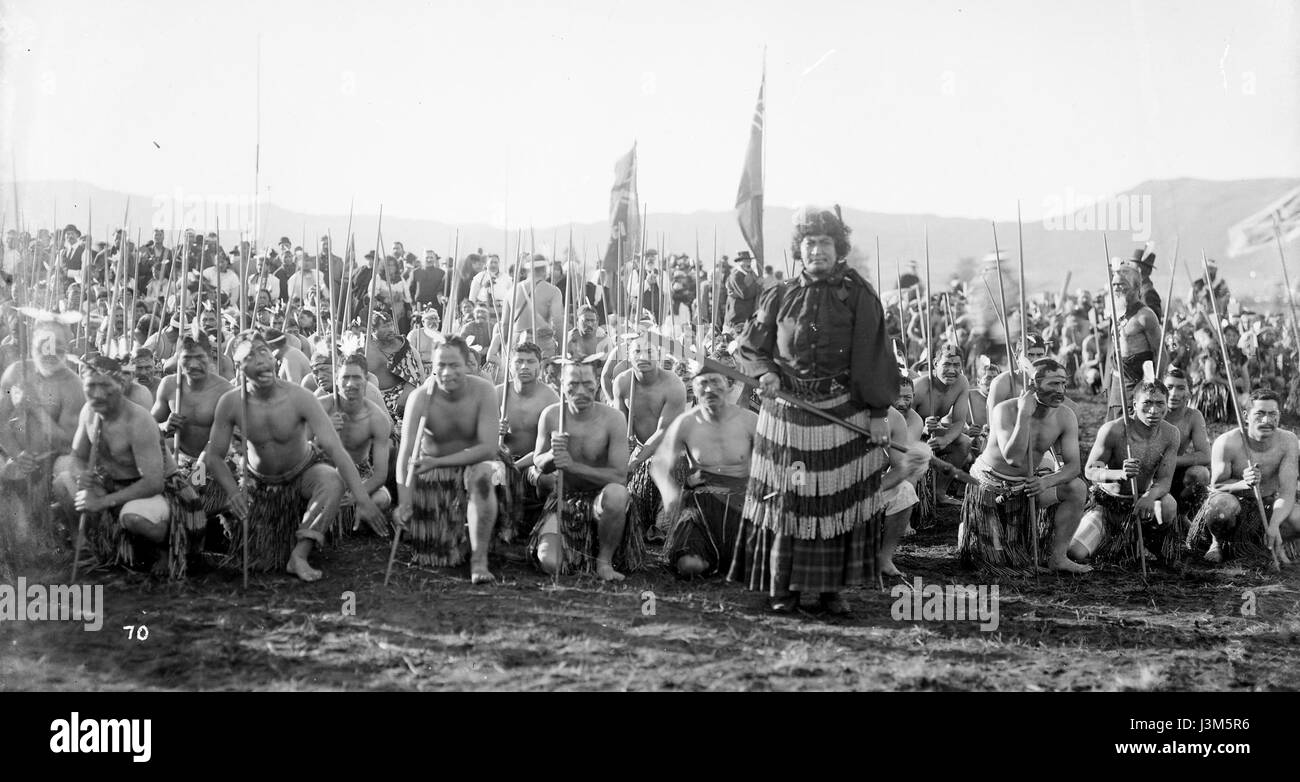 This photograph, taken in 1901, shows a group of Maori people ...